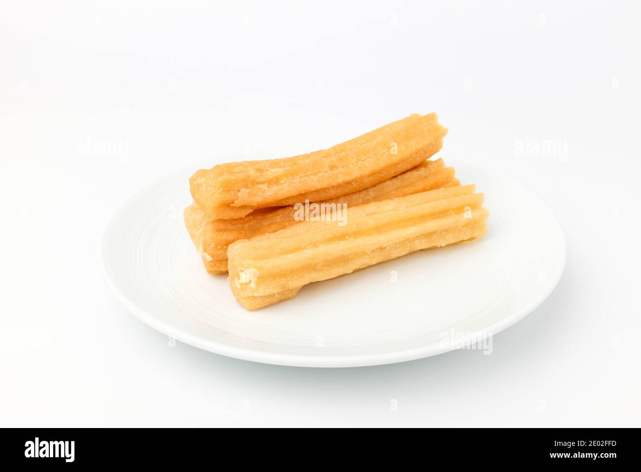 Elongated Churos on white background Stock Photo - Alamy
