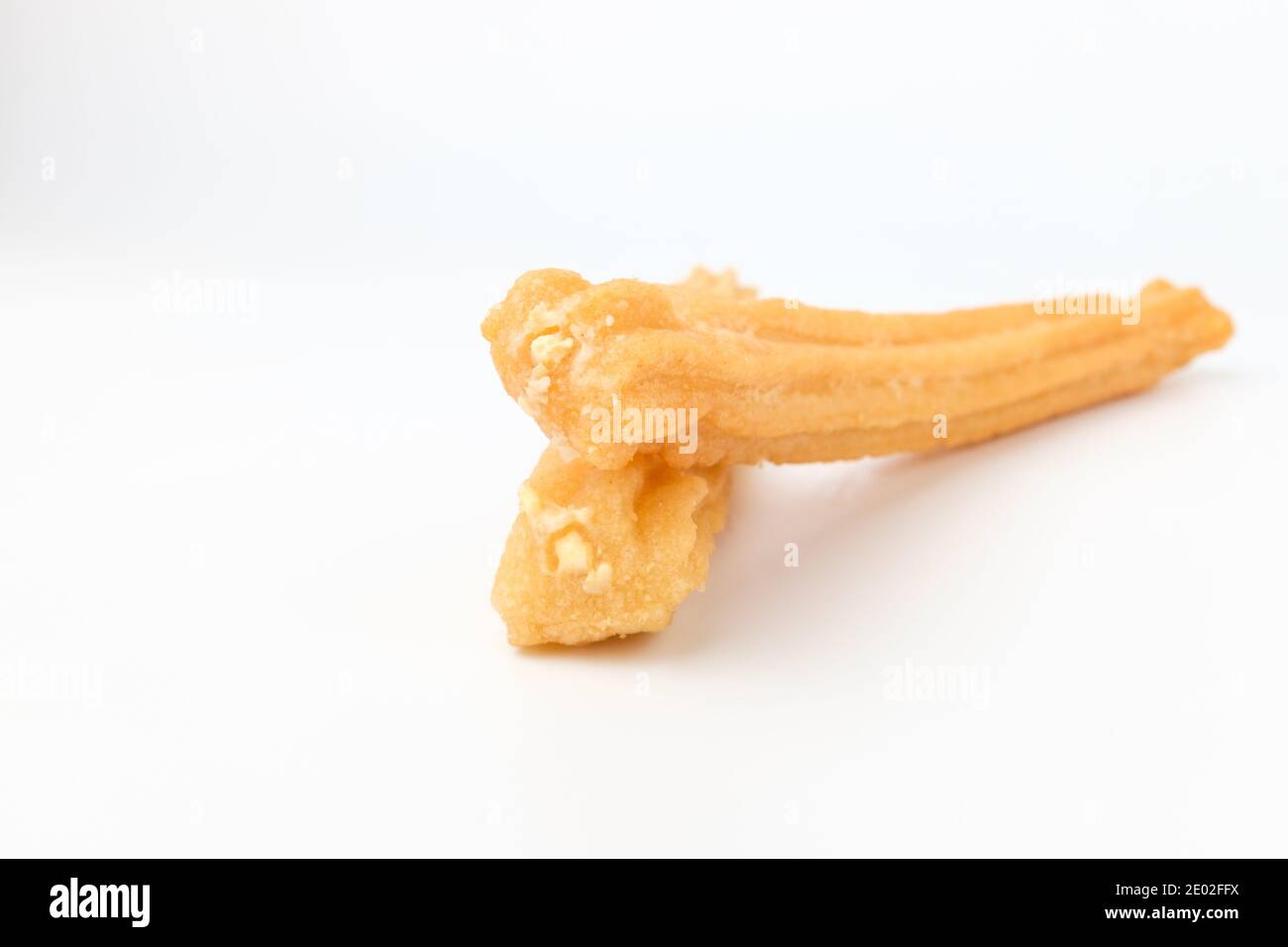 Elongated Churos on white background Stock Photo - Alamy