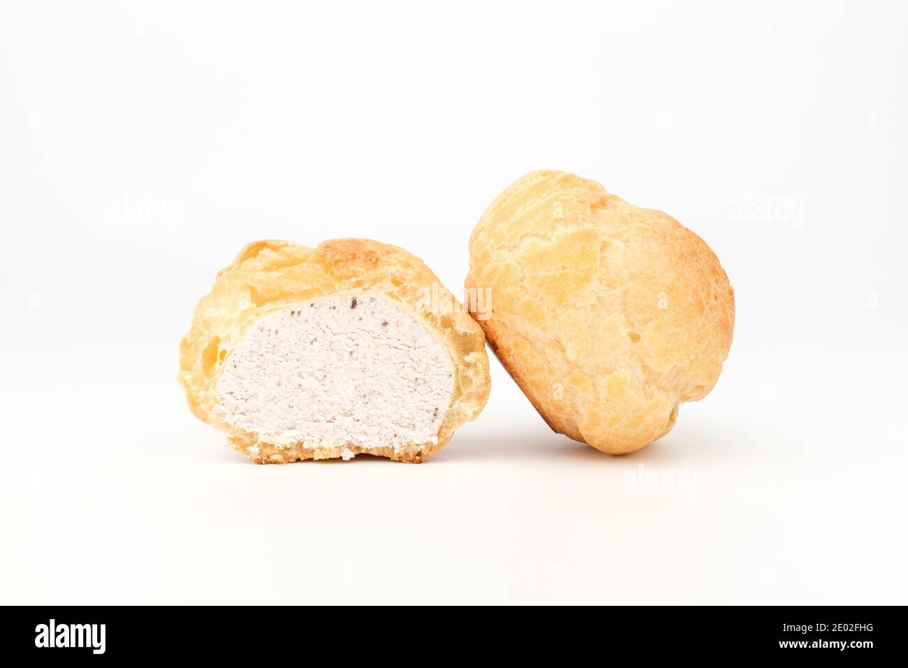 Cream puff on white background Stock Photo - Alamy