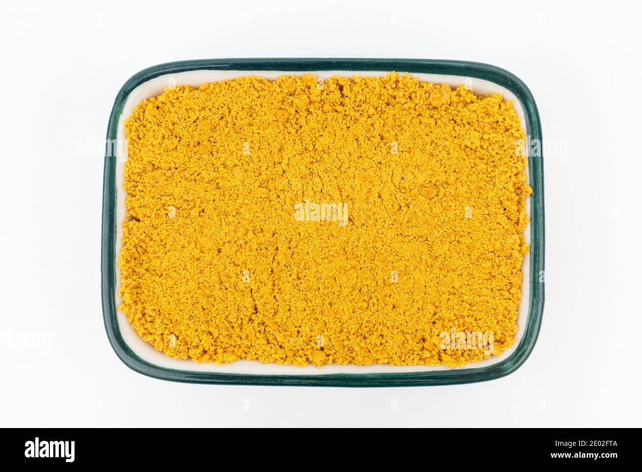 Curry powder on white background Stock Photo - Alamy