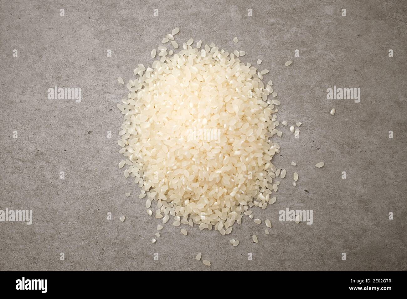 White rice on white background Stock Photo - Alamy