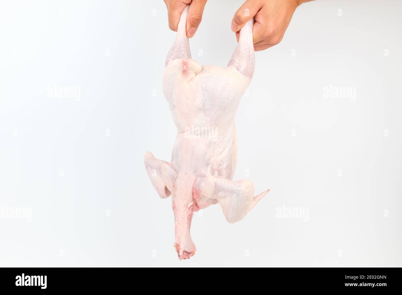 Raw chicken on rough background Stock Photo - Alamy