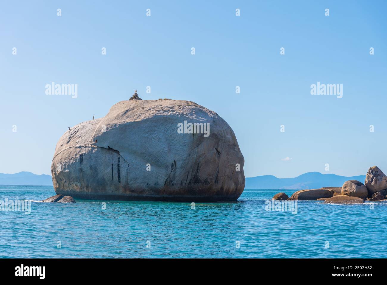 Giant boulder at Abel Tasman national park in New Zealand Stock Photo ...