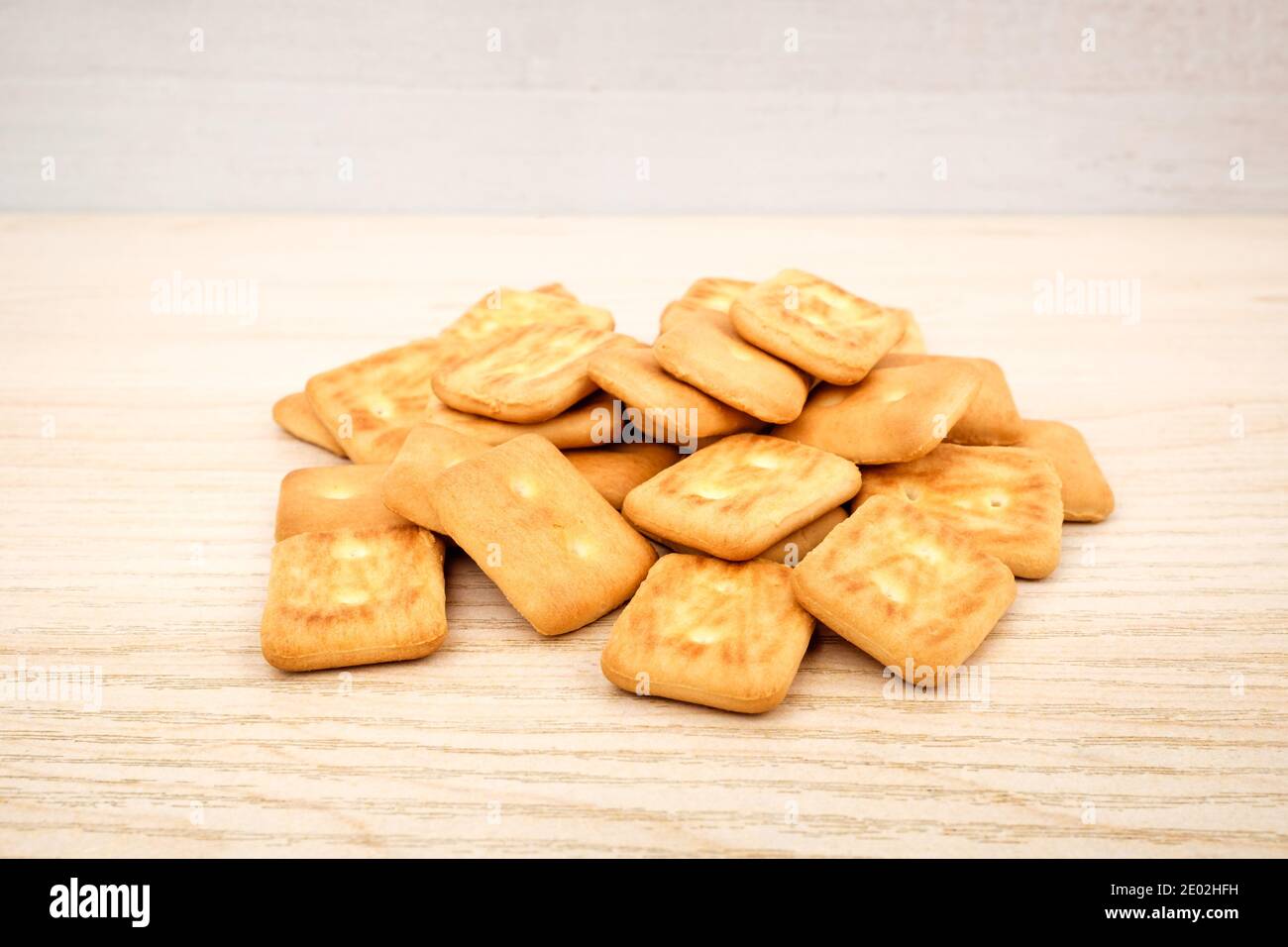 Small biscuit on white background Stock Photo - Alamy