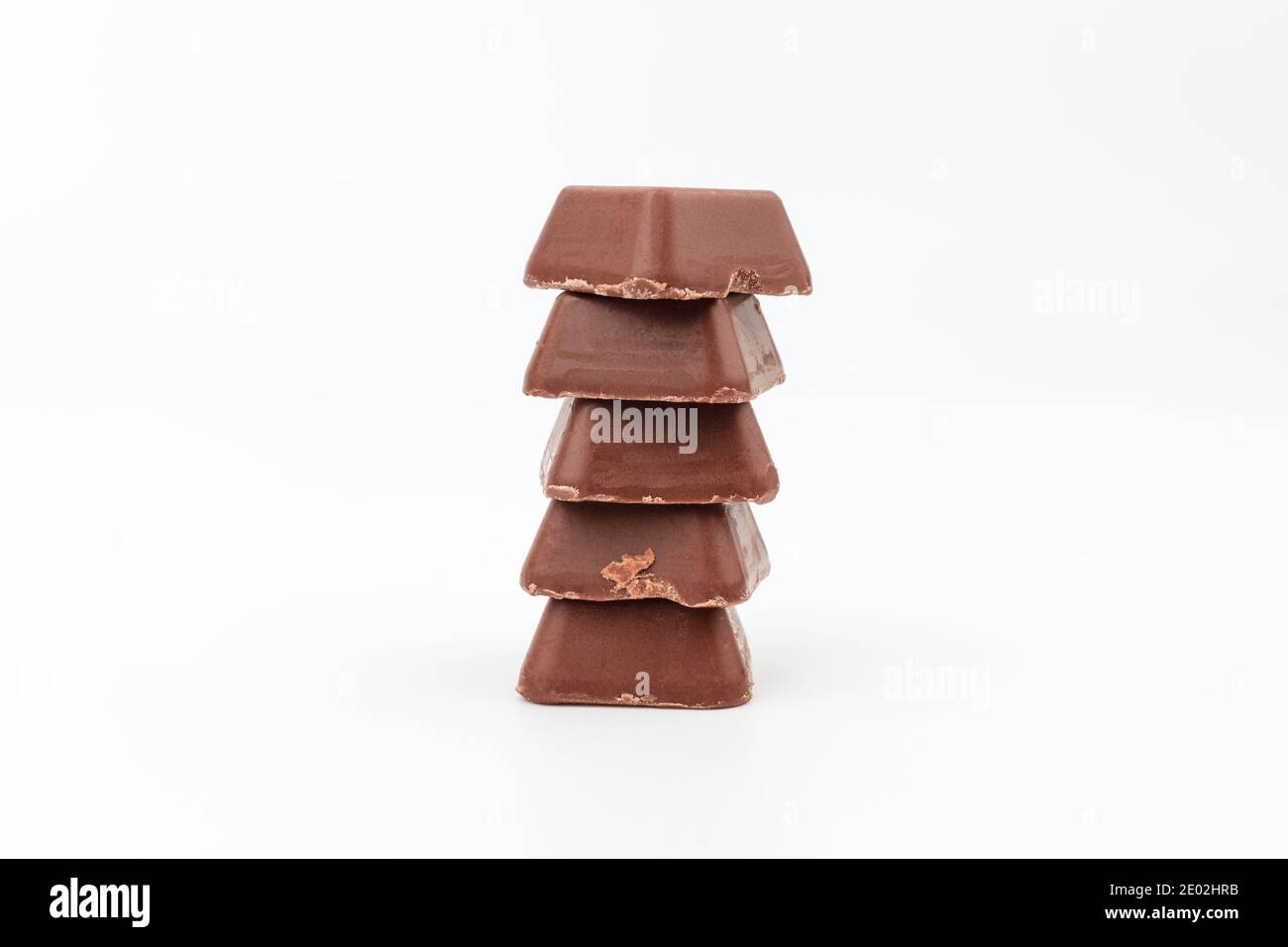 Small chocolate on white background Stock Photo - Alamy