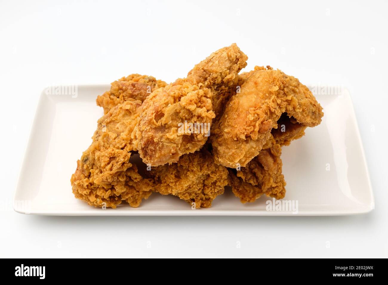 Fried chicken on white background Stock Photo - Alamy