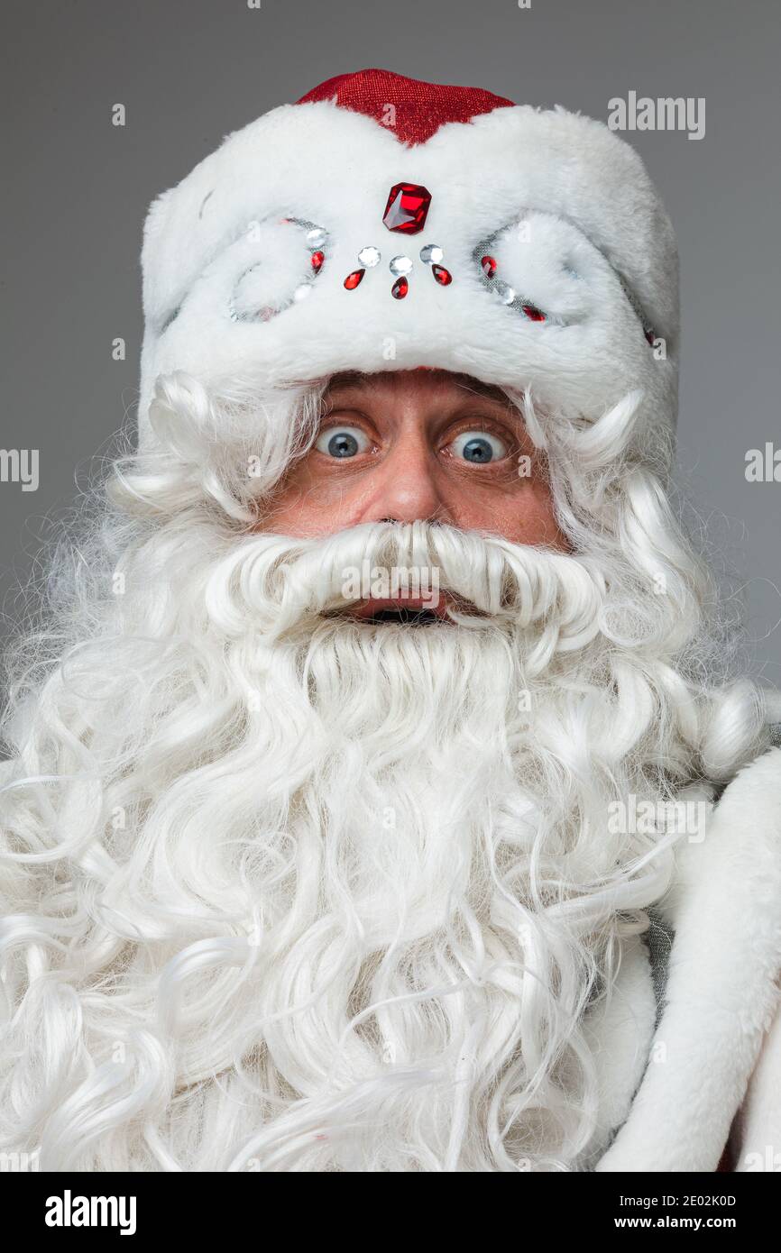 portrait of surprised santa claus with big eyes in his suit Stock Photo ...