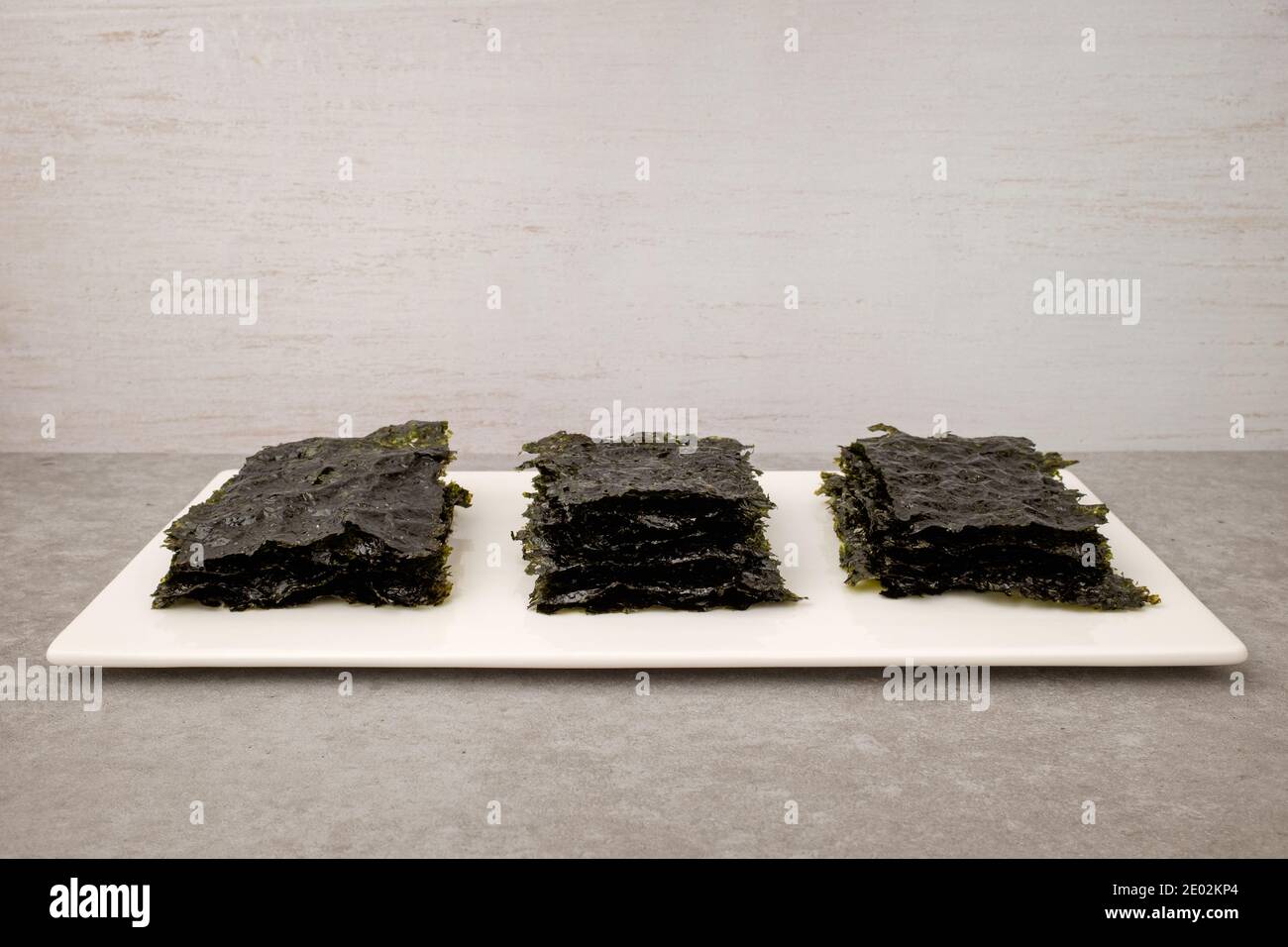Green Blue seaweed on a white background Stock Photo - Alamy