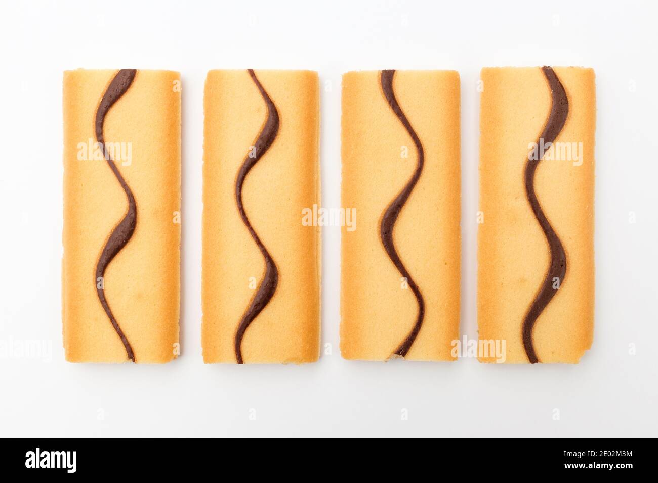 Thin biscuits on a white background Stock Photo - Alamy