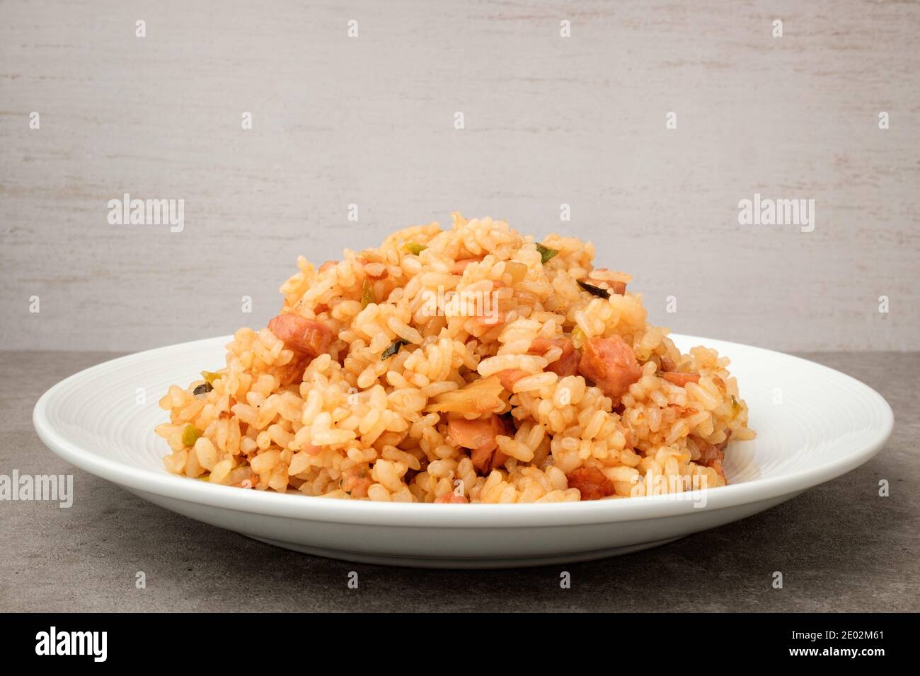 Seasoned fried rice on white background Stock Photo - Alamy