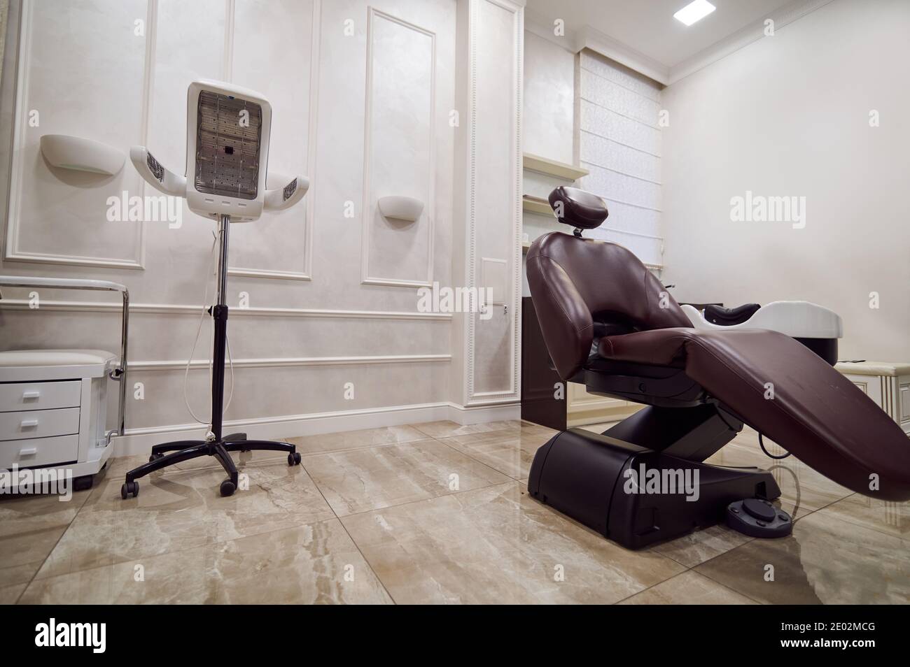 Empty brown chair in barber shop or beauty salon. Luxury interior ...