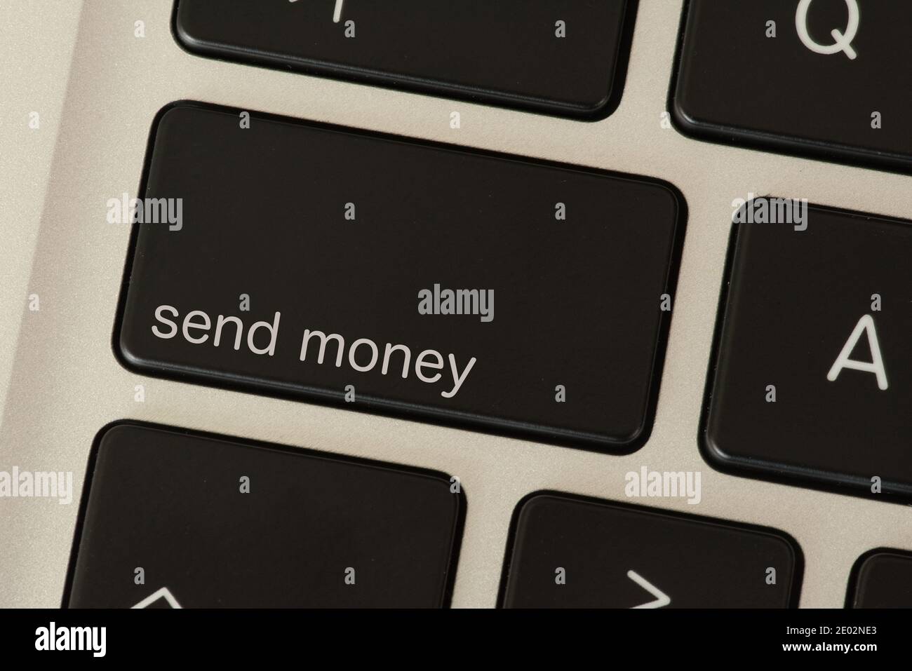 A computer and key to send money Stock Photo - Alamy