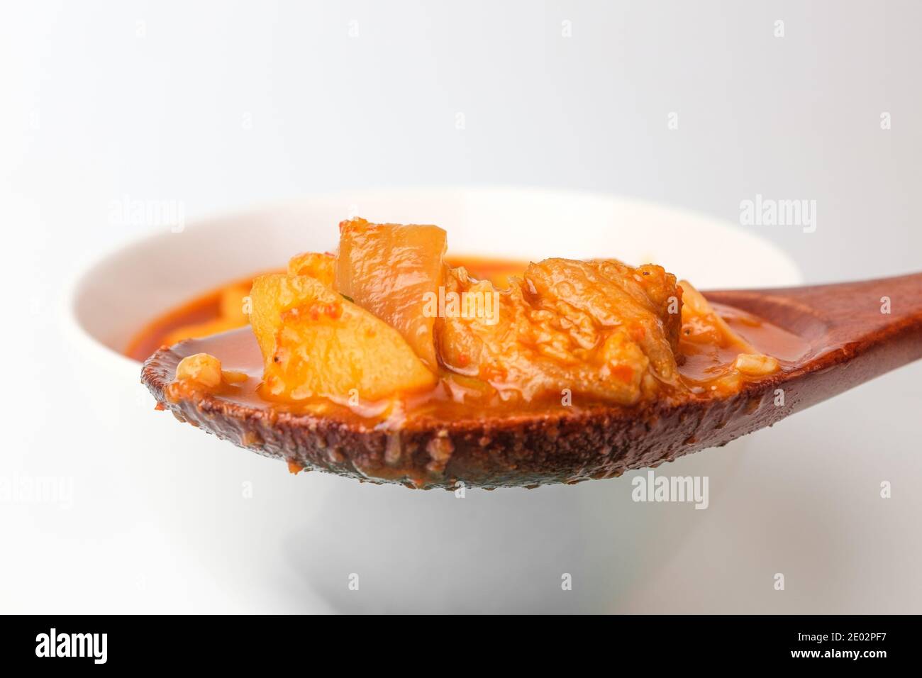 Red pepper paste stew on white background Stock Photo - Alamy