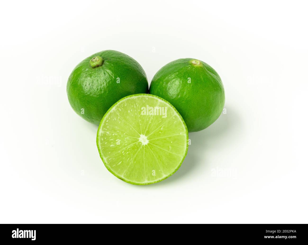 Ripe slice of green lime citrus fruit stand isolated on white ...