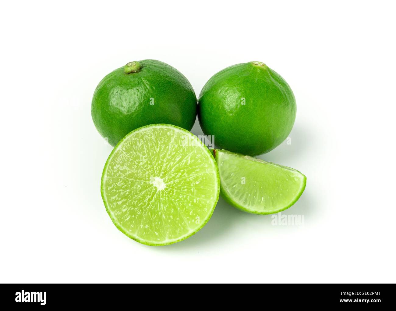 Ripe slice of green lime citrus fruit stand isolated on white ...