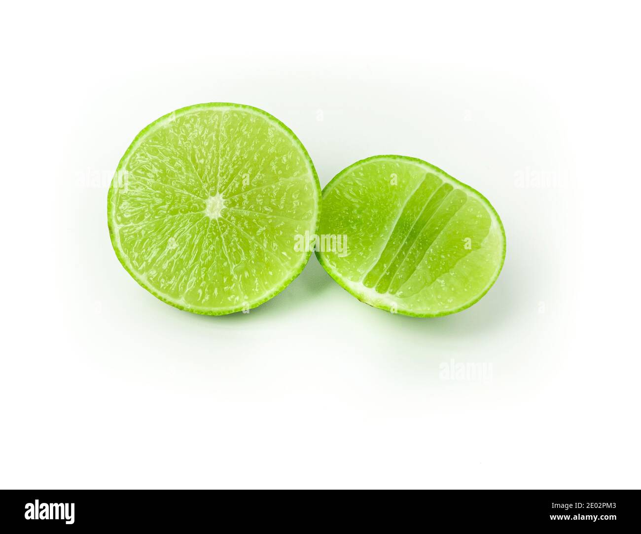 Ripe slice of green lime citrus fruit stand isolated on white ...