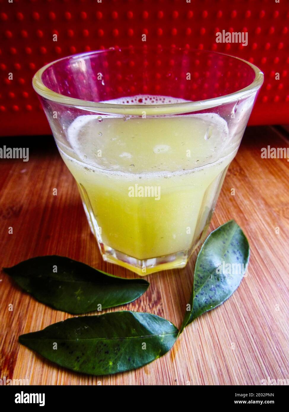 A glass of fresh Lemon Juice Stock Photo - Alamy