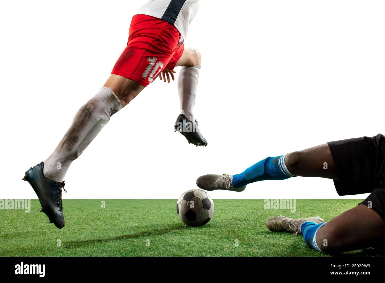 Close up legs of professional soccer, football players fighting for ...