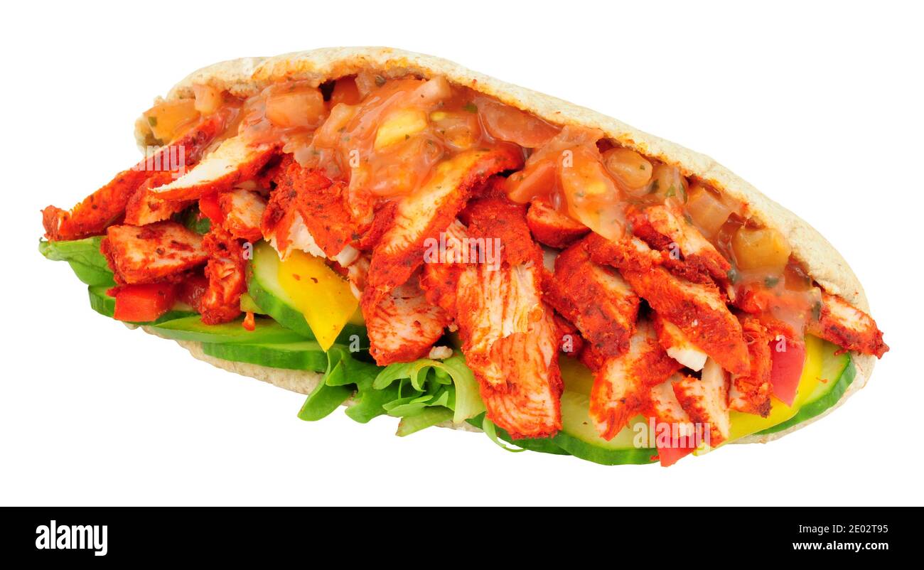 Tandoori chicken and salad pitta bread sandwich isolated on a white ...