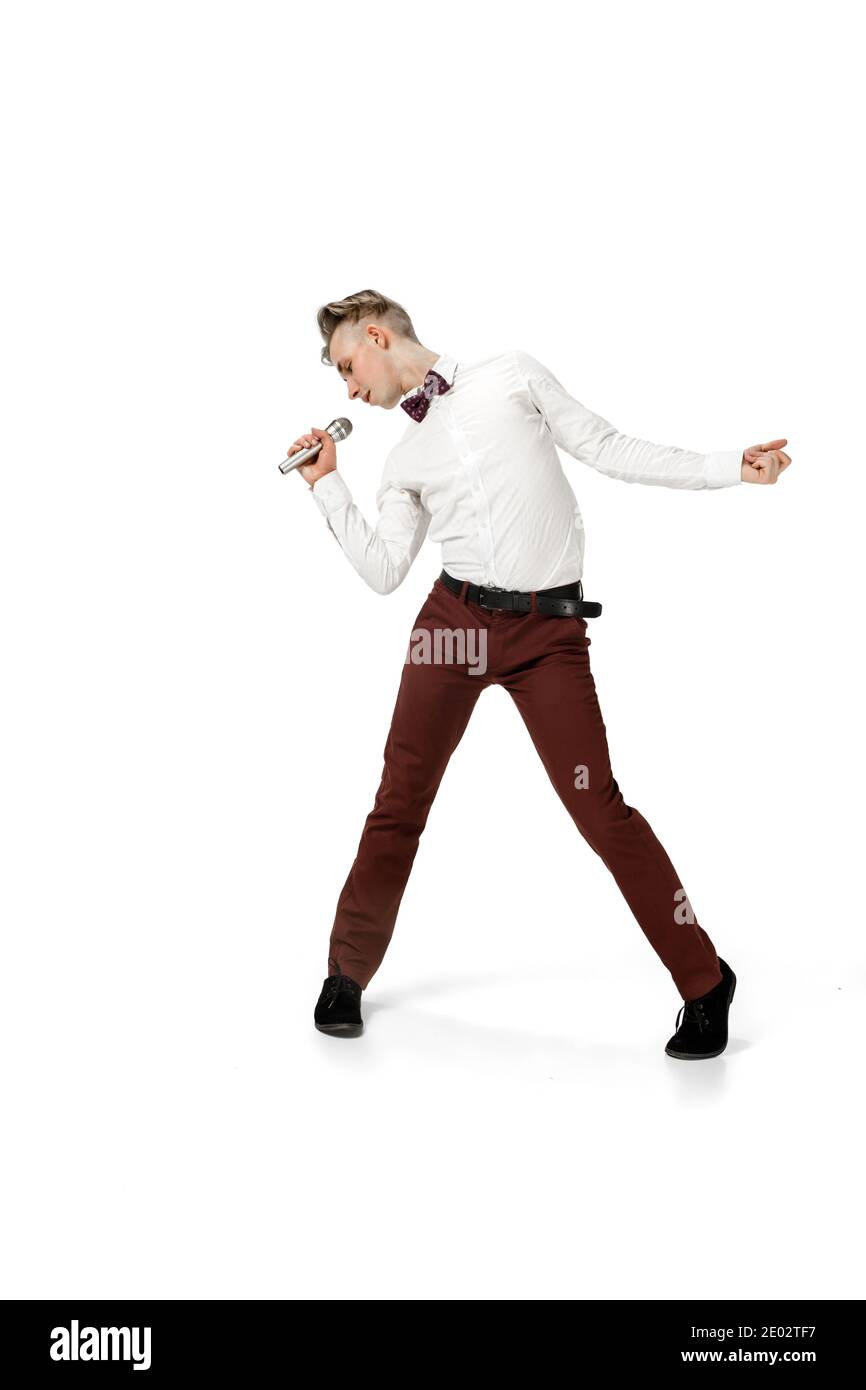 Singer. Happy young man dancing in casual clothes or suit, remaking ...