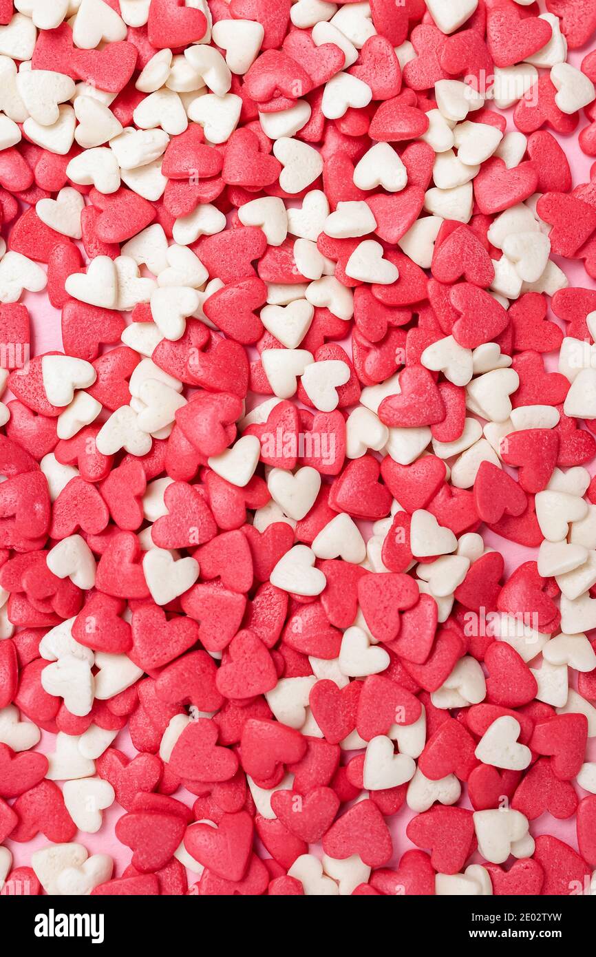 Valentine's day background with small hearts Stock Photo - Alamy