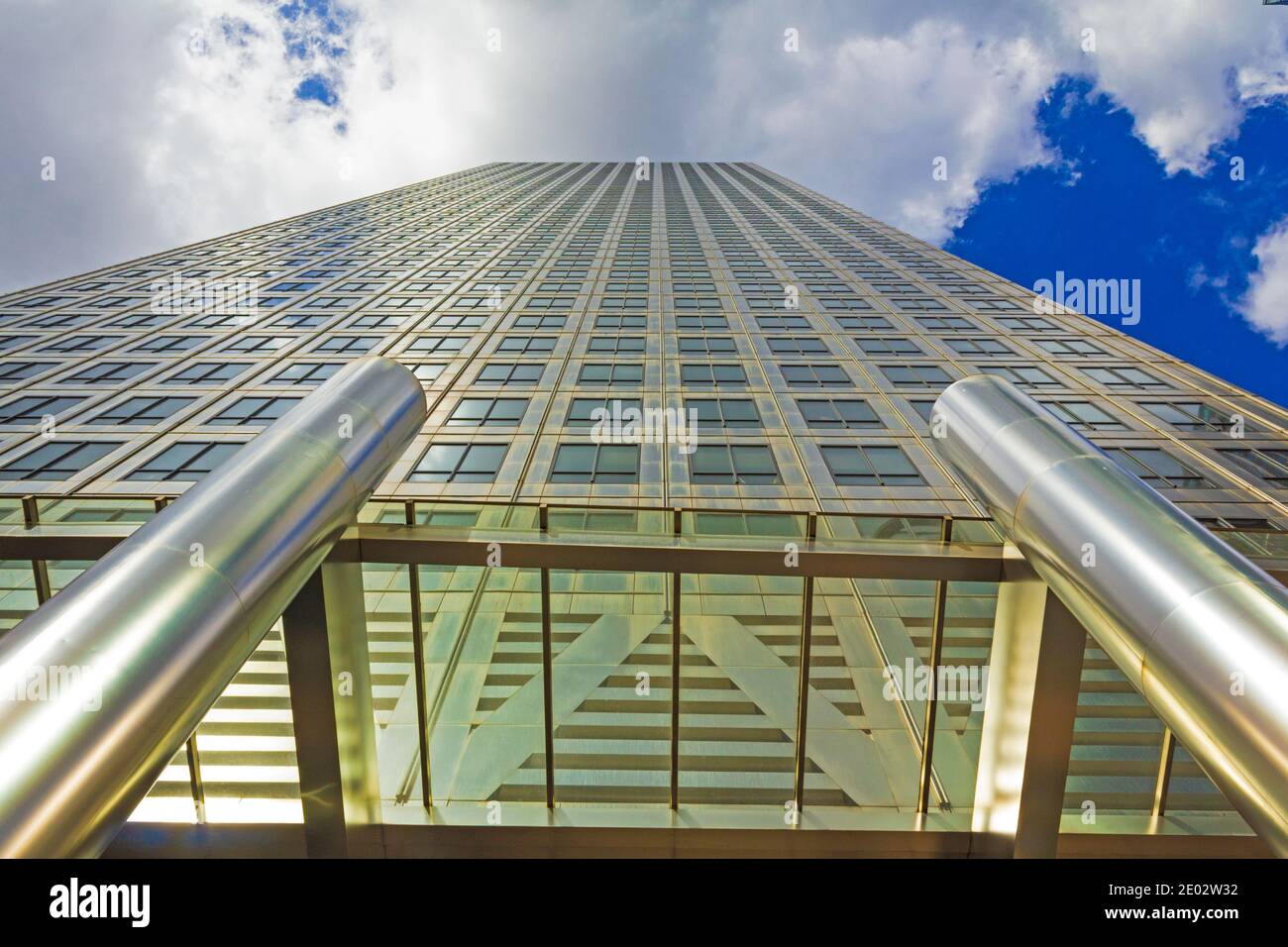 View of modern tall building from metal and glass in business district ...