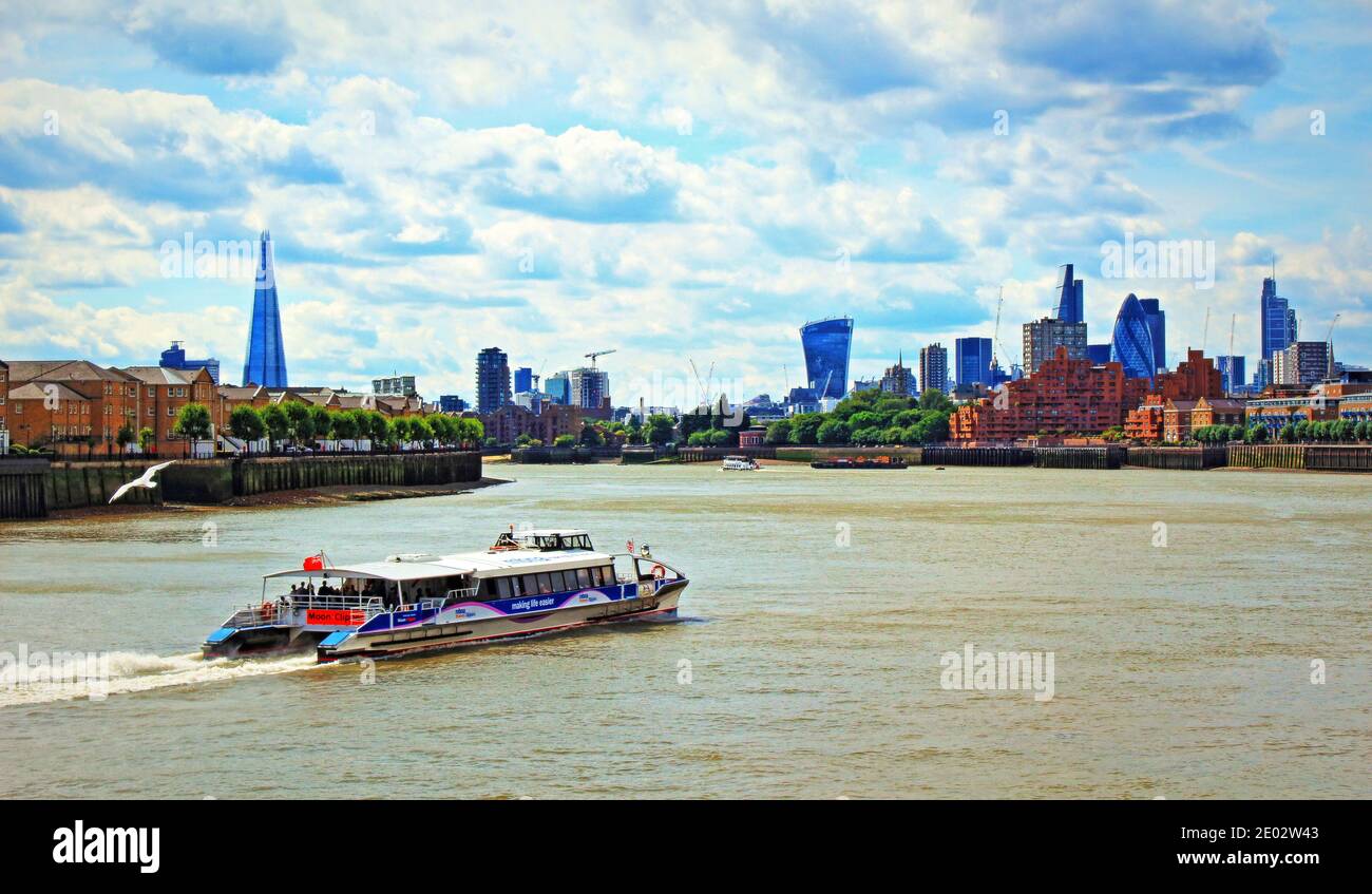 River bus floating Thames River,picturesque London skyline background ...