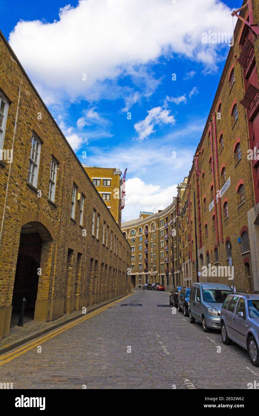 A view of Wapping High Street with old warehouse buildings,e East End ...