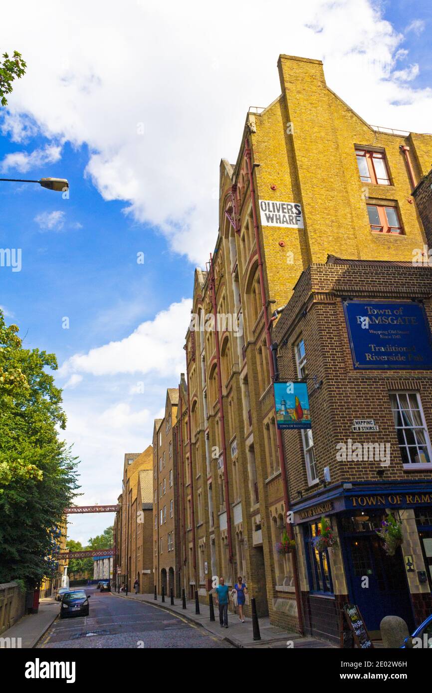 A view of Wapping High Street with old warehouse buildings,e East End ...