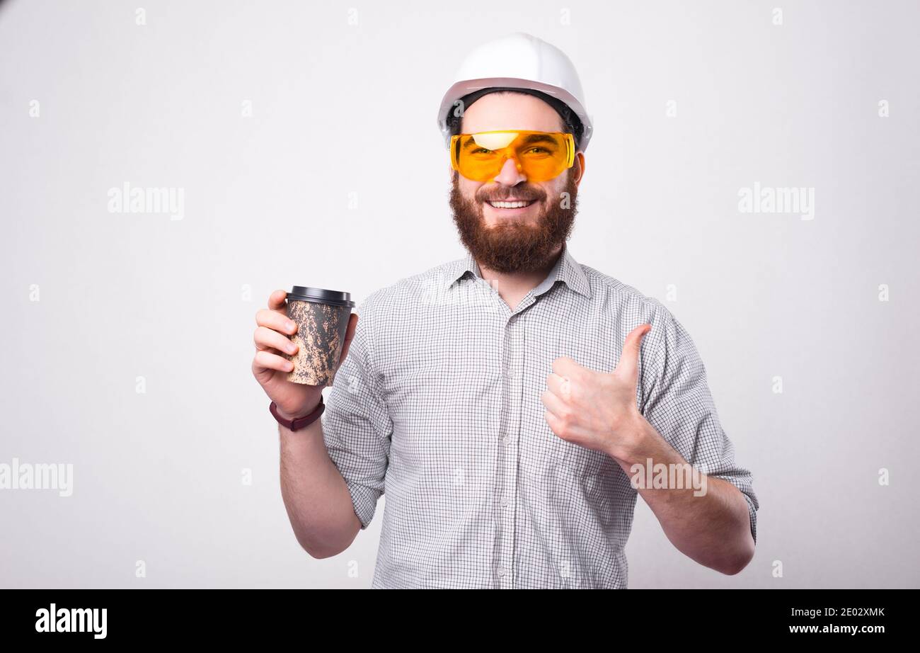 Tea drinking man builder hi-res stock photography and images - Alamy