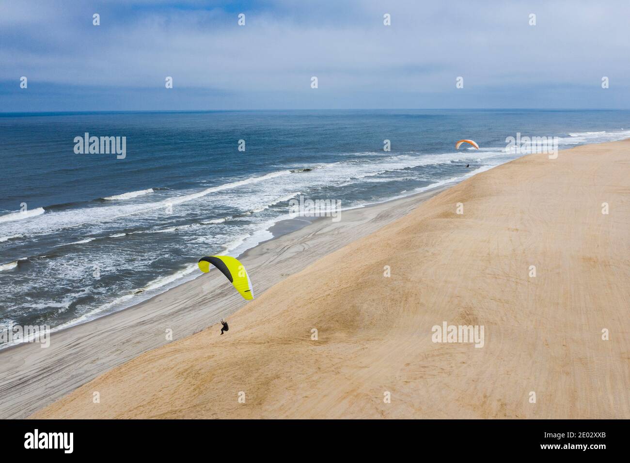 Paragliding at Dune near Henties Bay, Henties Bay, Namibia Stock Photo ...