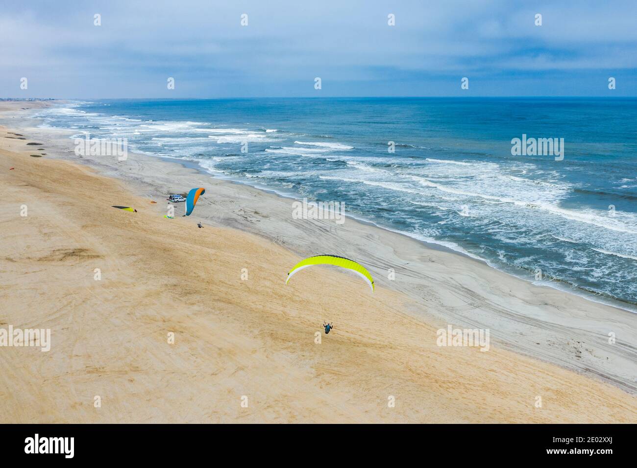 Paragliding at Dune near Henties Bay, Henties Bay, Namibia Stock Photo ...