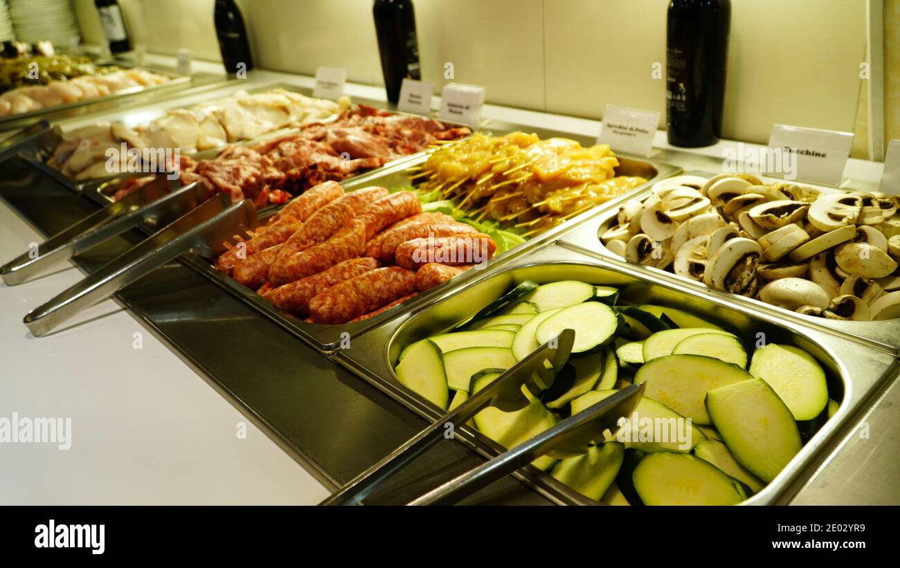 Coronavirus, Covid-19, no people in cafeteria with snacks, sausages ...