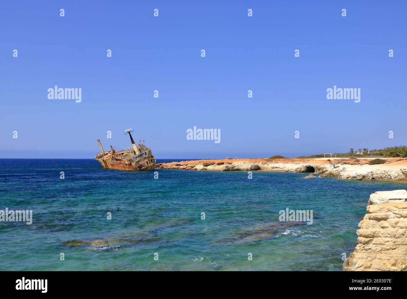 Shipwreck of the abandoned ship Edro III on the rocky coast at Akrotiri ...