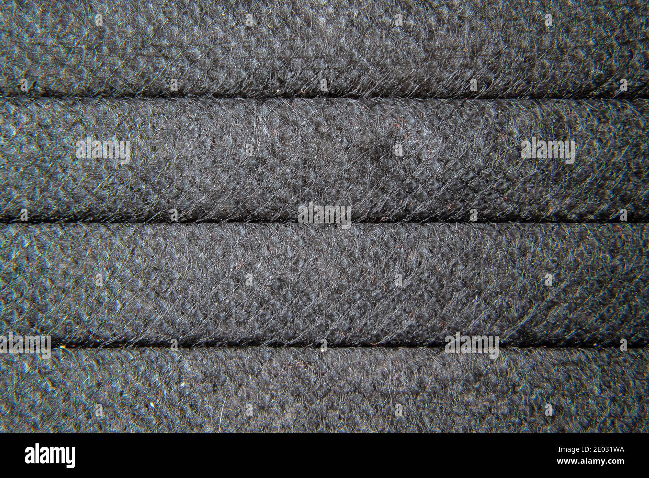 Black medical face mask texture. Close up of surgical mask fabric with ...