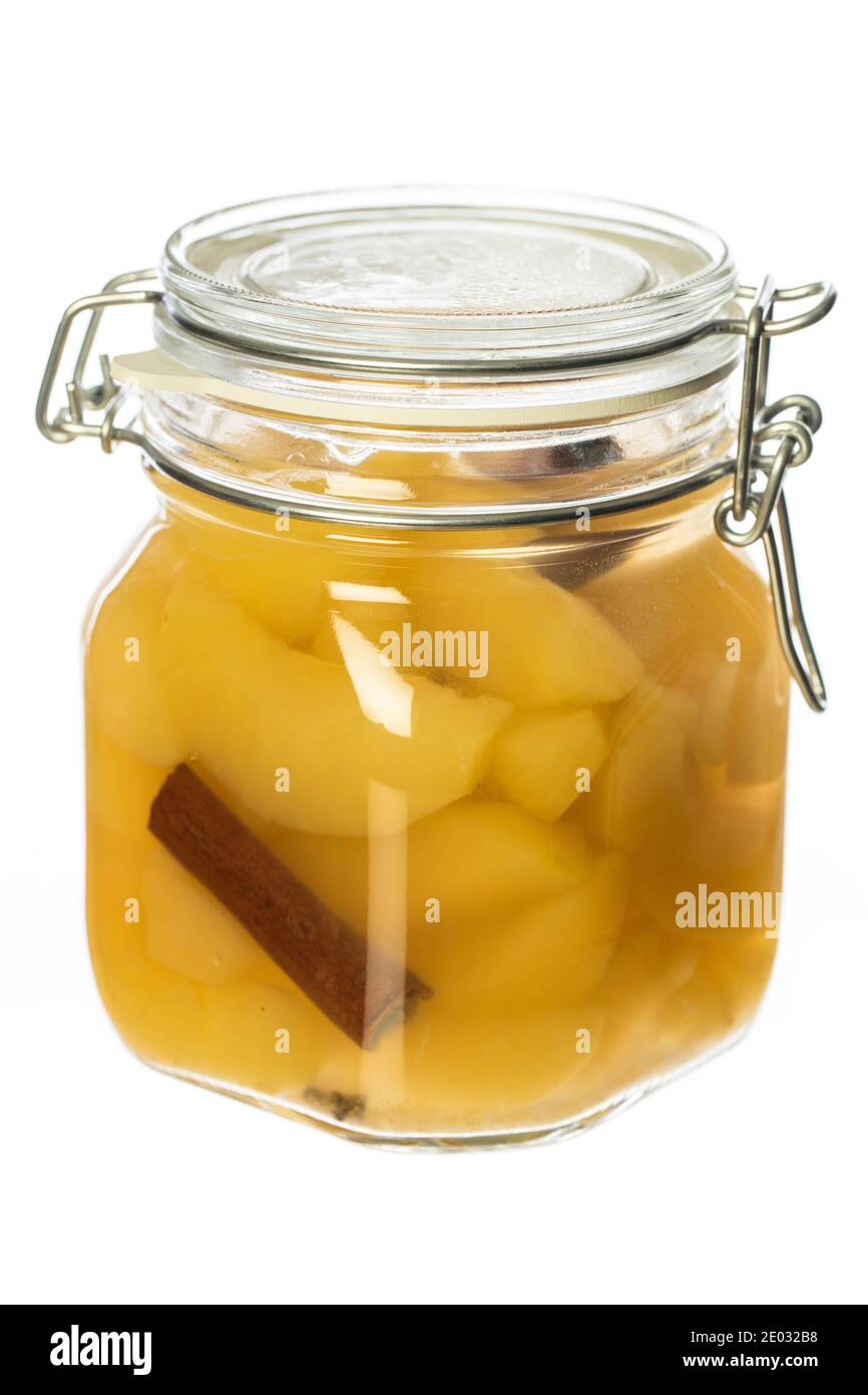 apple compote in traditional jar with metal closure isolated on white ...