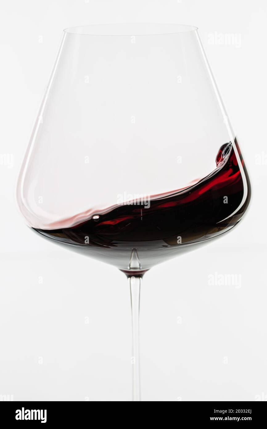 red wine waving in the glass Stock Photo - Alamy