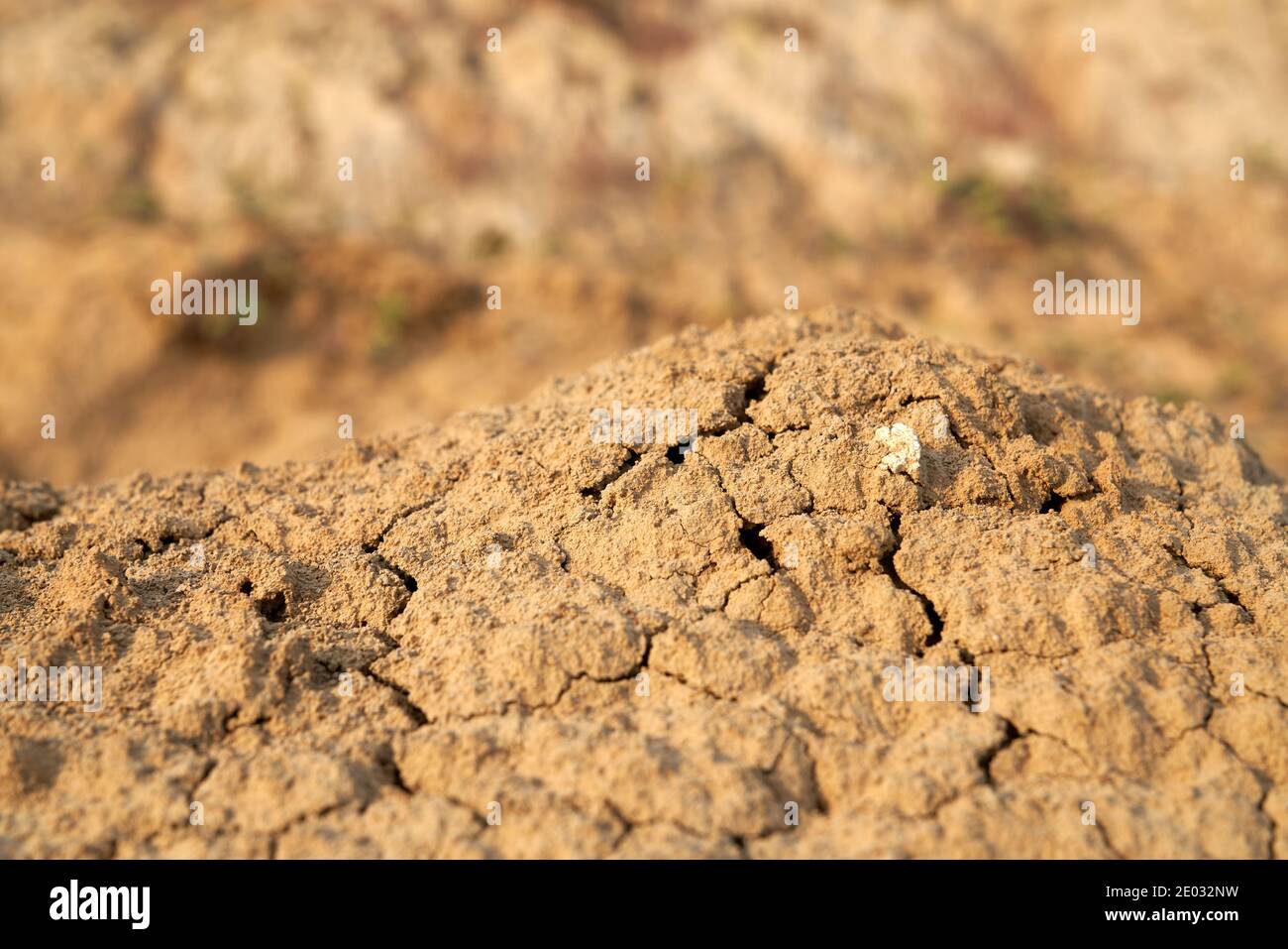 Above view of piles of brown crumbly sand in desert. Concept of drought ...