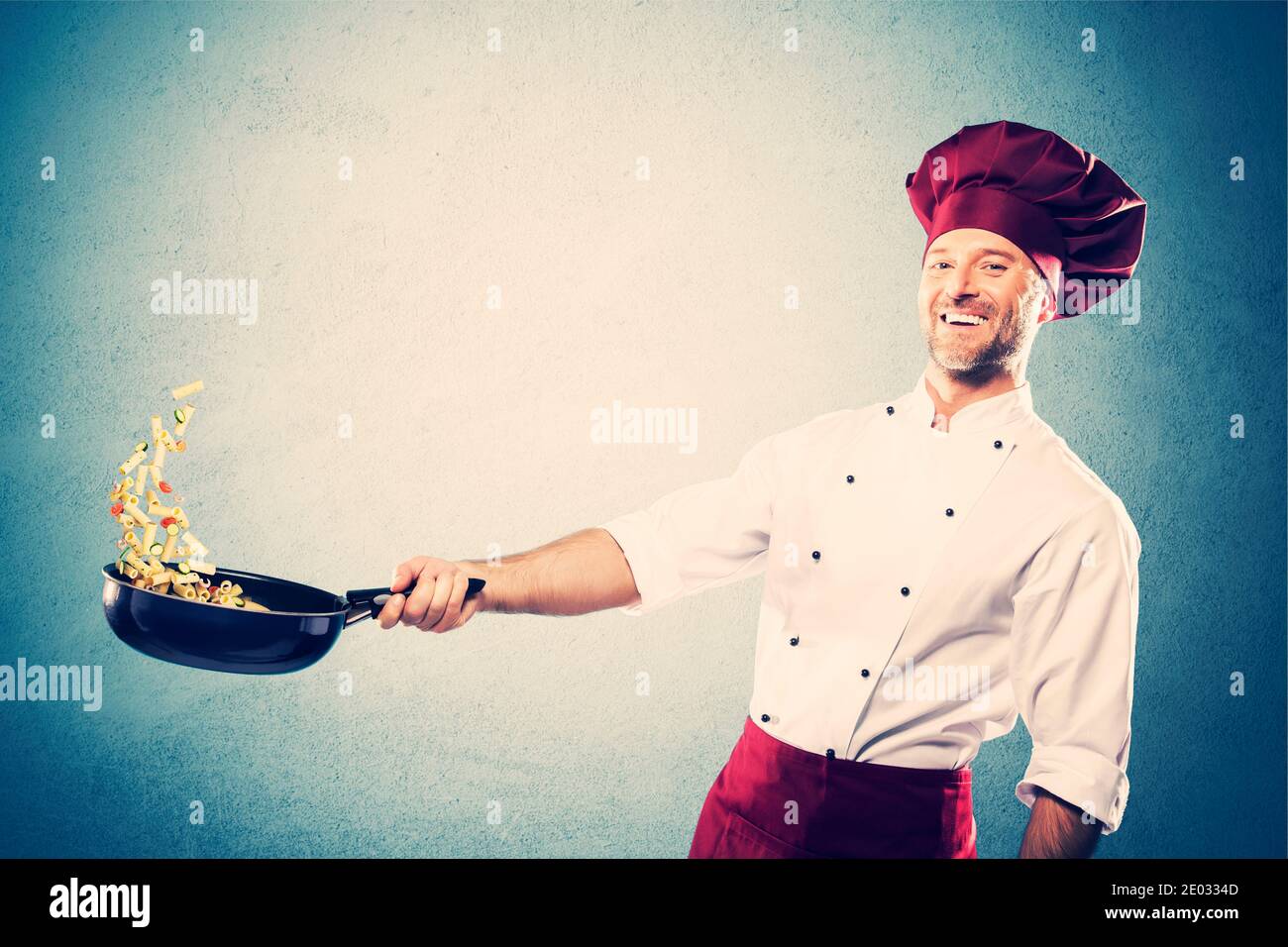 People cooking on cooker hi-res stock photography and images - Alamy