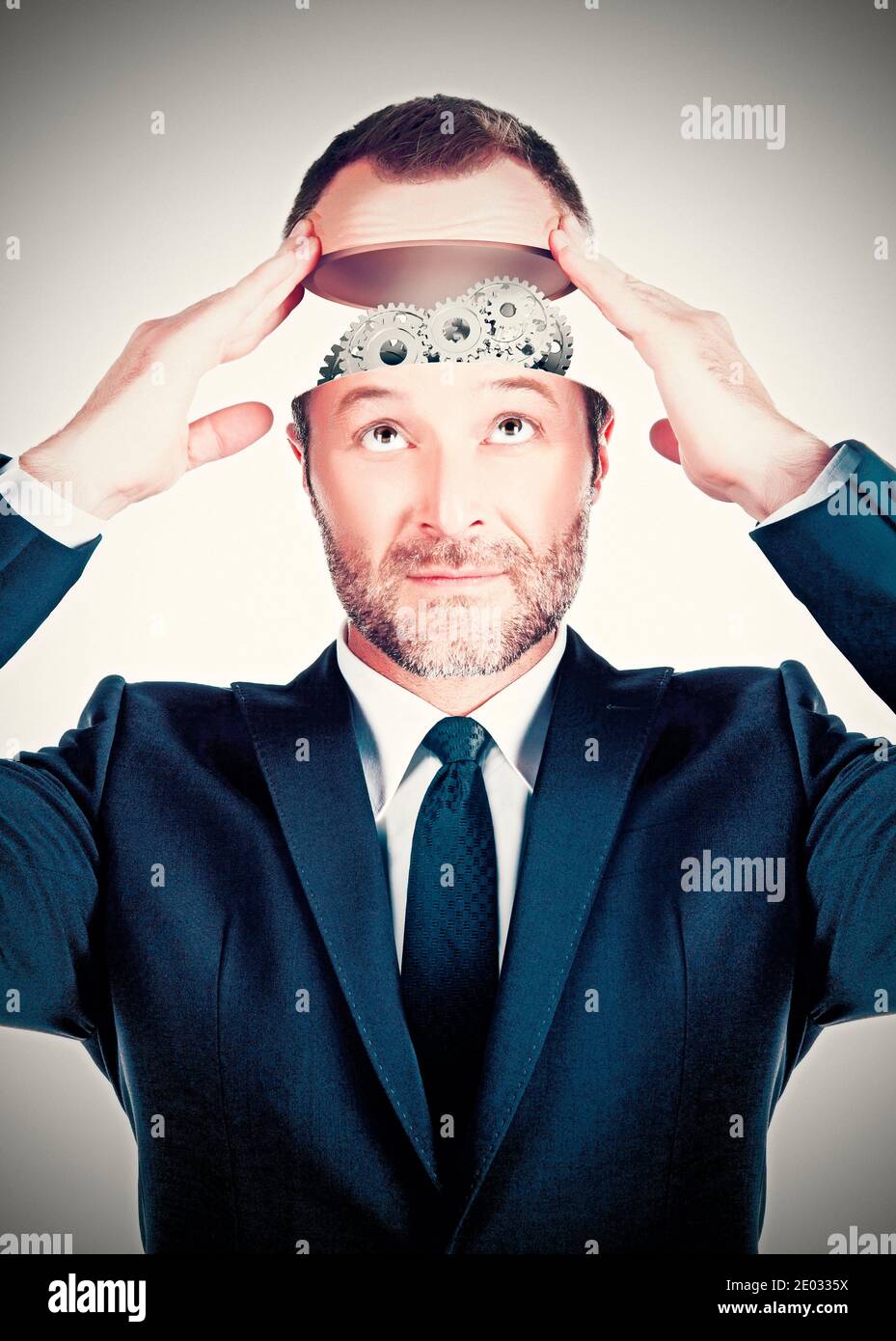 Conceptual image of a businessman showing gears in his head Stock Photo ...