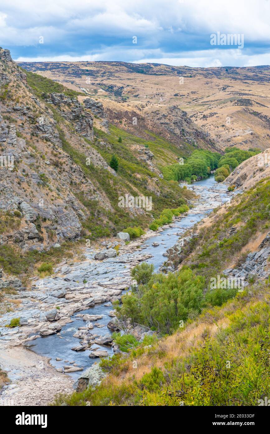 Valley of Taieri river at Central Otago Railway bicycle trail in New ...