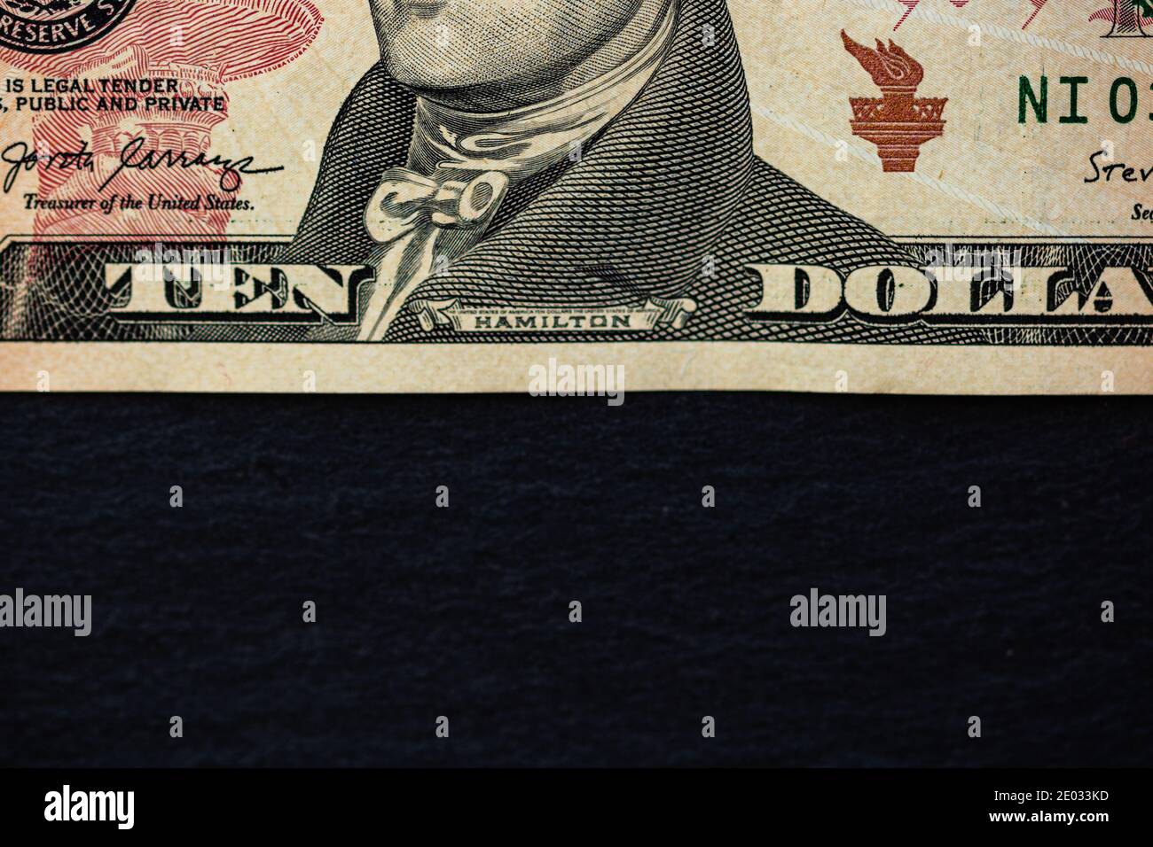 Selective focus on detail of 10 dollars banknote. Close up macro detail ...