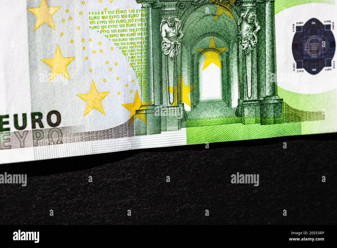 Selective focus on detail of euro banknotes. Close up macro detail of ...