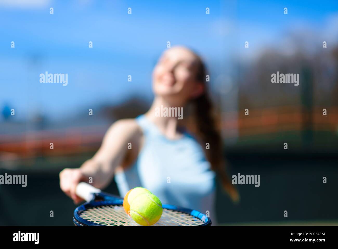 Tennis balls and rocket on court field in sunny day, sport, hobby Stock ...