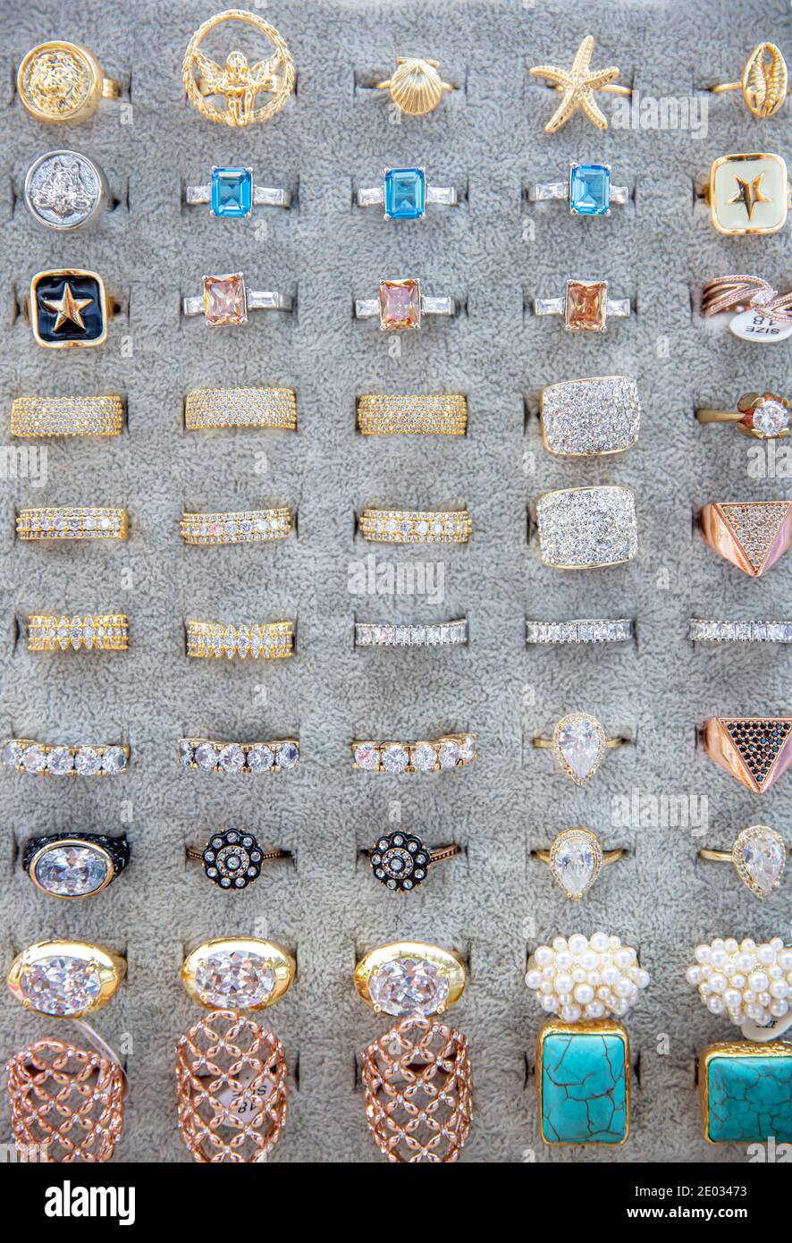 Jewelry diamond rings and necklaces display in upscale retail store ...