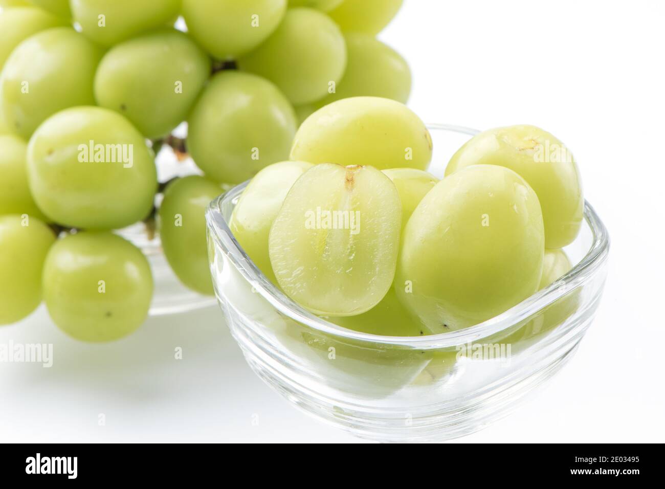 Close up of beautiful boxed Shrine Muscat green grape isolated on white ...