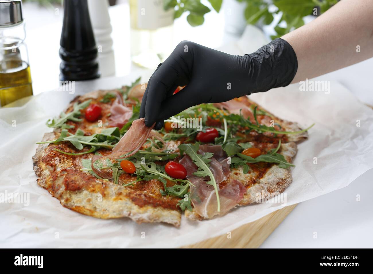 Italian pizza with ham. Traditional Italian pizza with Parma ham ...