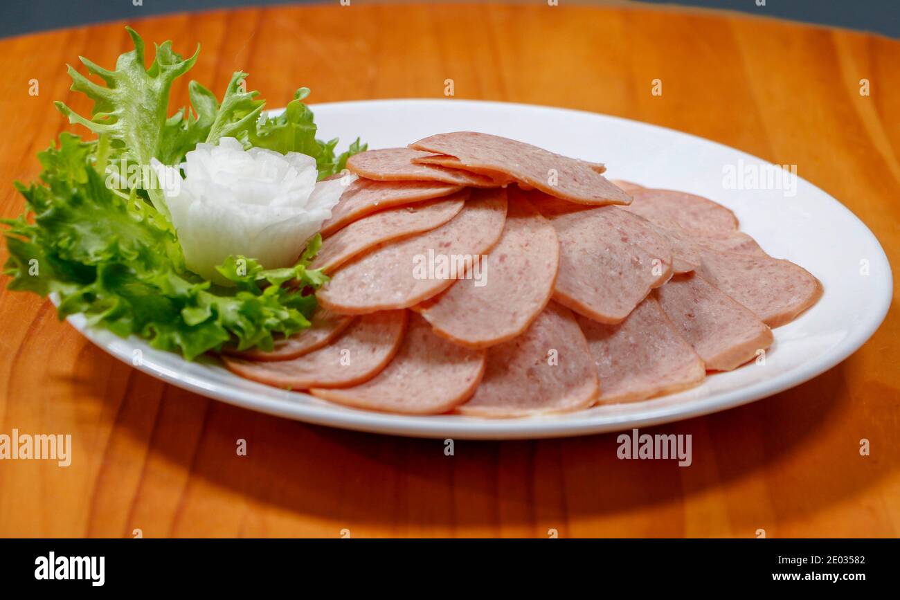 Plate of ham slices with green vegetable, homemade breakfast, healthy ...