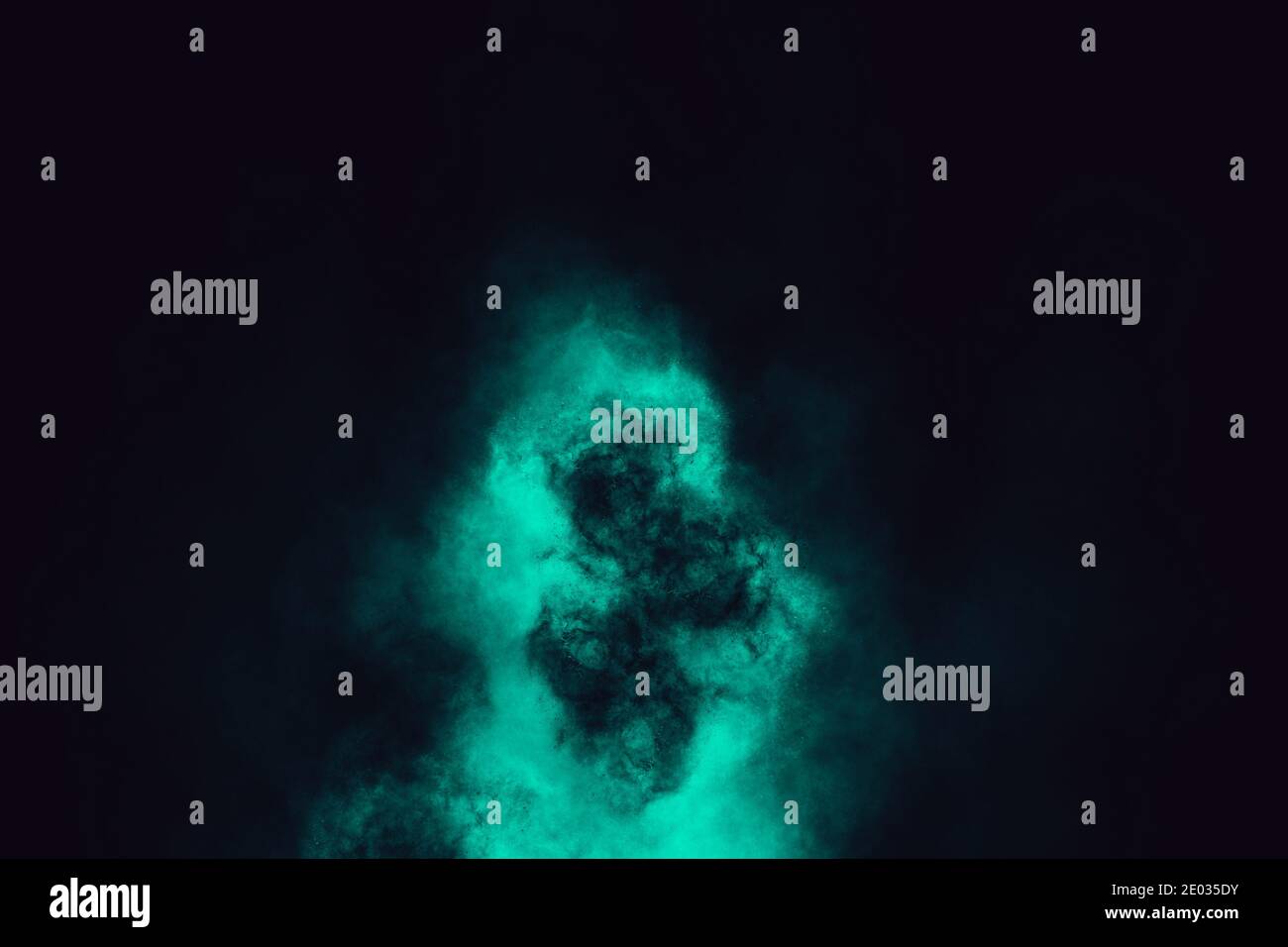 Turquoise and green light is shining on the dark, dim, murky and gloom ...