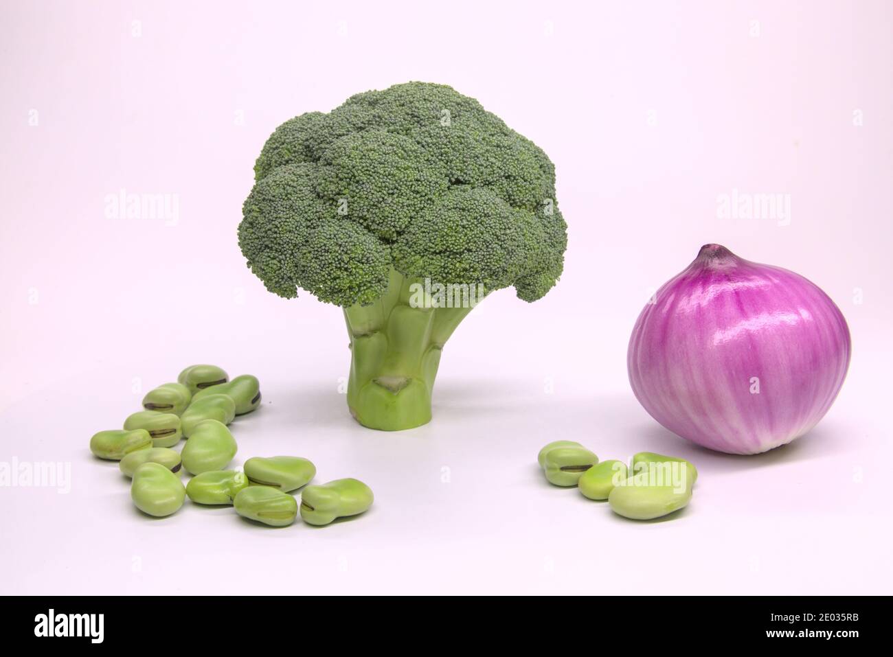 Organic healthy vegetables, broccoli, onion and broad beans Stock Photo ...